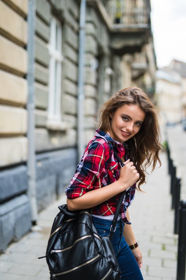 Happy Charming Young Woman with Backpack Walking in the City Back View ...