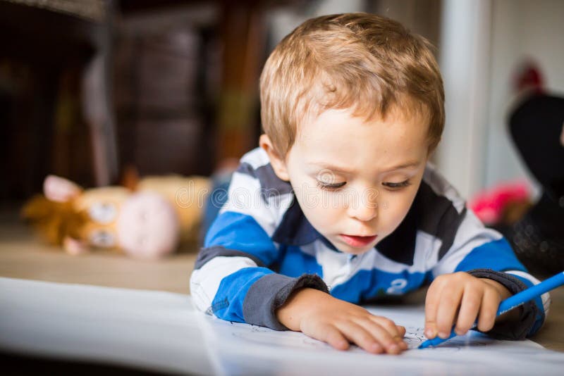 Happy Cheerful Child Drawing at Home. Creativity Concept Stock Photo ...