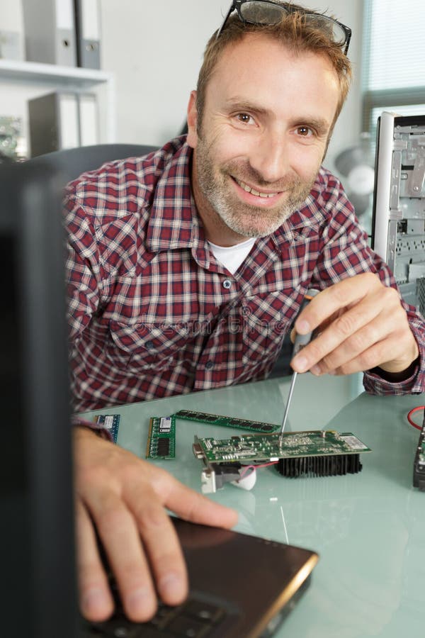 Happy Cheerful Man Fixing Computer Stock Image - Image of hardware ...