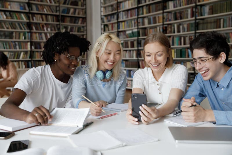 Happy Cheerful Multiethnic Group of Students Sharing Mobile Phone Stock ...