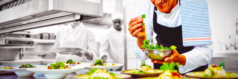 Happy Chef Garnishing Appetizer Plates at Order Station Stock Image ...