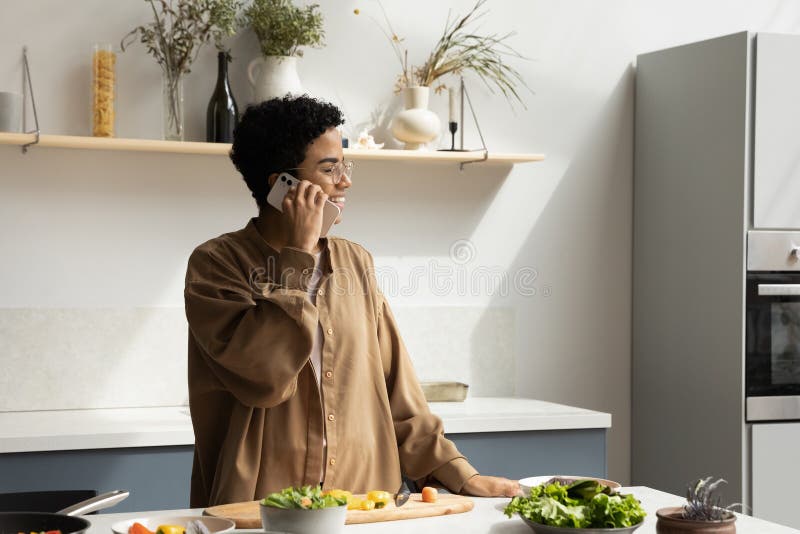 Happy Chef Girl Talking on Mobile Phone from Home Kitchen Stock Image ...
