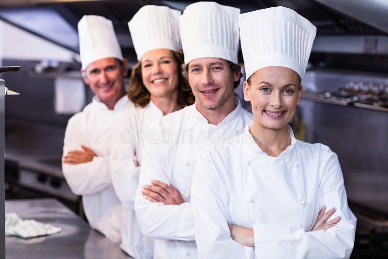 Happy Chefs Team Standing Together in Commercial Kitchen Stock Image ...