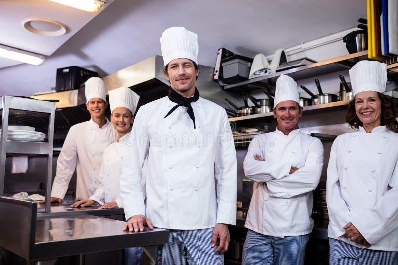 Happy Chefs Team Standing Together in Commercial Kitchen Stock Image ...