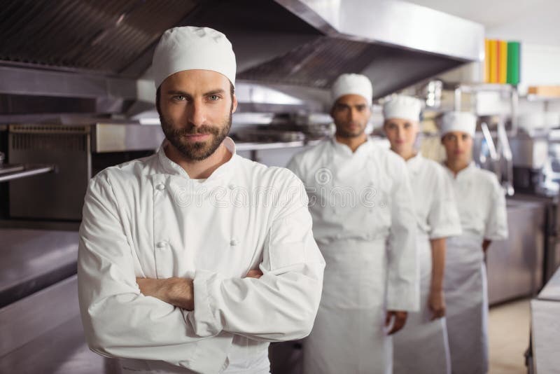 Happy Chefs Team Standing Together in Commercial Kitchen Stock Image ...