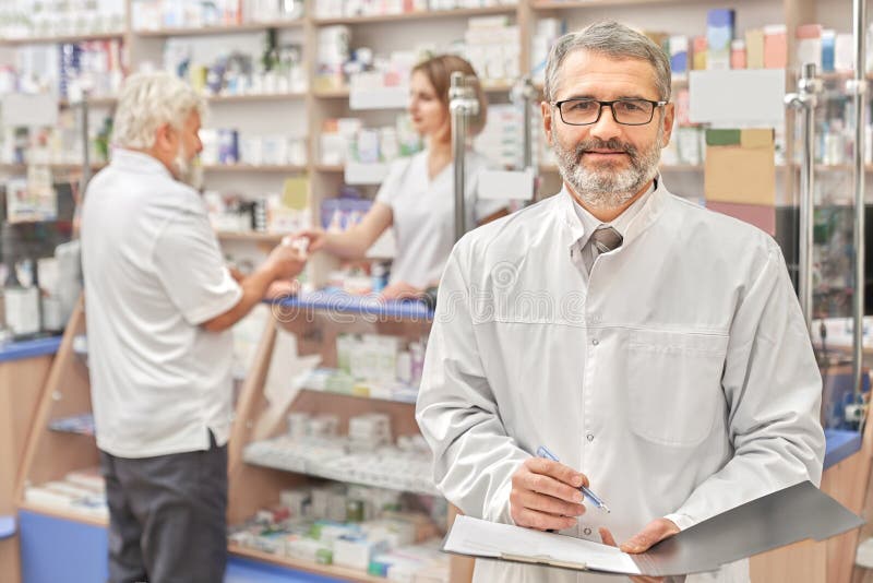 Happy Chemist Smiling, Posing in Pharmacy. Stock Photo - Image of ...
