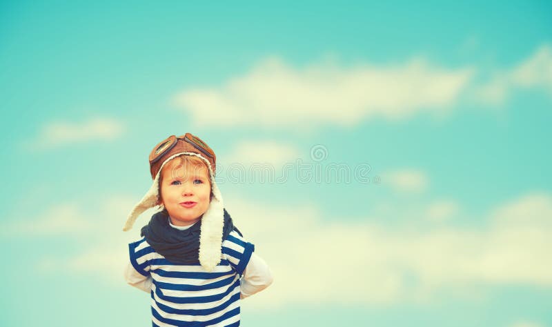 Happy Child Aviator Pilot Against Sky Stock Photo - Image of helmet ...