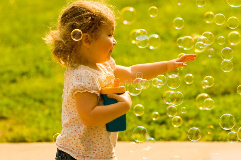 Happy Child Chasing Soap Bubbles Stock Image - Image of game, full ...
