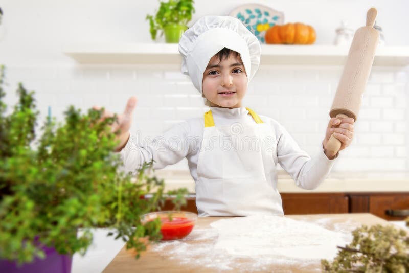 Happy child cooking stock photo. Image of prepare, professional - 173053012