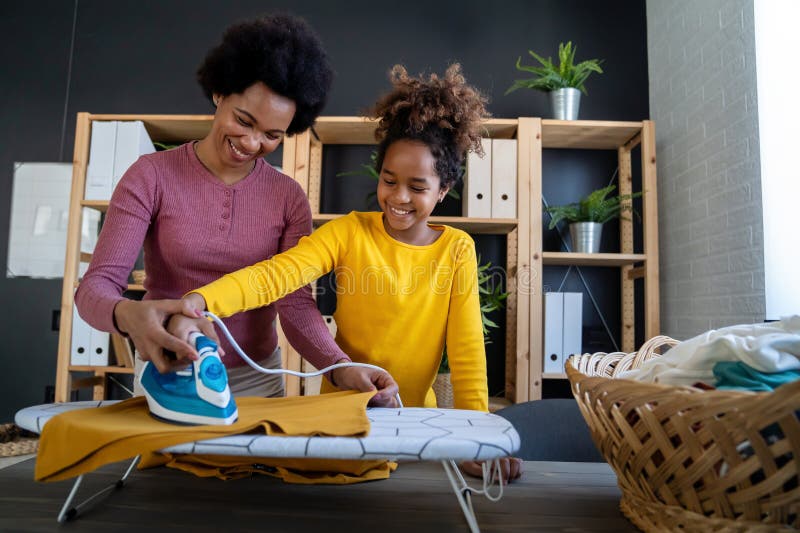 Happy Child Doing Housework with Mother and Helping Stock Photo - Image ...