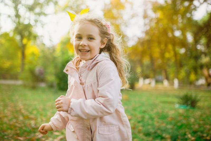 Happy Child Girl Having Fun in Autumn Park Stock Photo - Image of alley ...