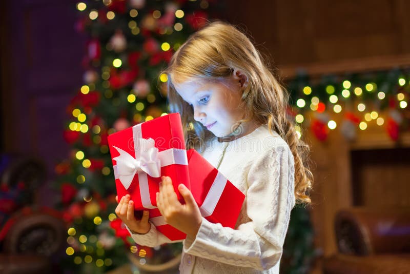Happy Child Girl with a Magic Christmas Gift Stock Image - Image of ...