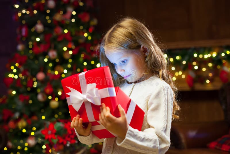 Happy Child Girl with a Magic Christmas Gift Stock Image - Image of ...