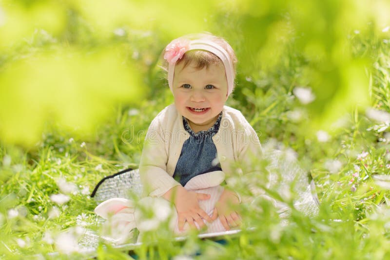 Happy Child in Grass stock image. Image of innocence - 40257757