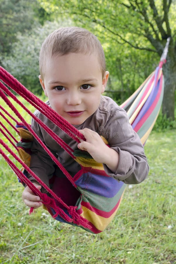 Happy child in hammock stock image. Image of person, beautiful - 40615629
