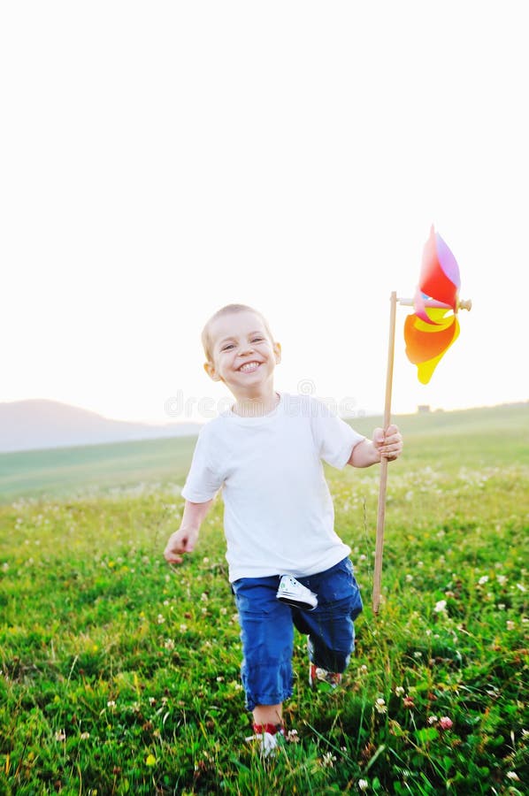Happy Child Have Fun Outdoor Stock Image - Image of green, grass: 10595525