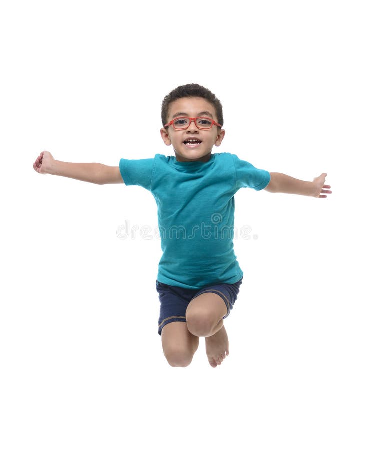 Happy Child Jumping in the Air Stock Photo - Image of jeans, casual ...