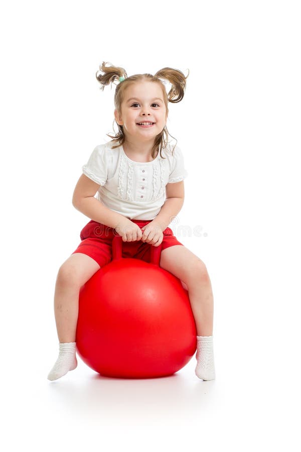 Happy Little Girl Jumping on Bouncing Ball Stock Photo - Image of ...