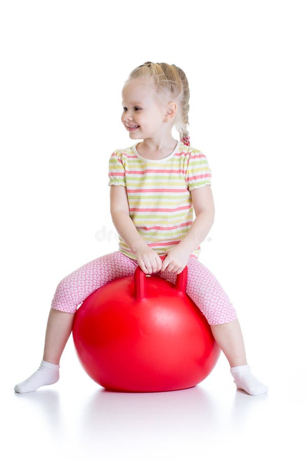 Happy Little Girl Jumping on Bouncing Ball Stock Photo - Image of ...