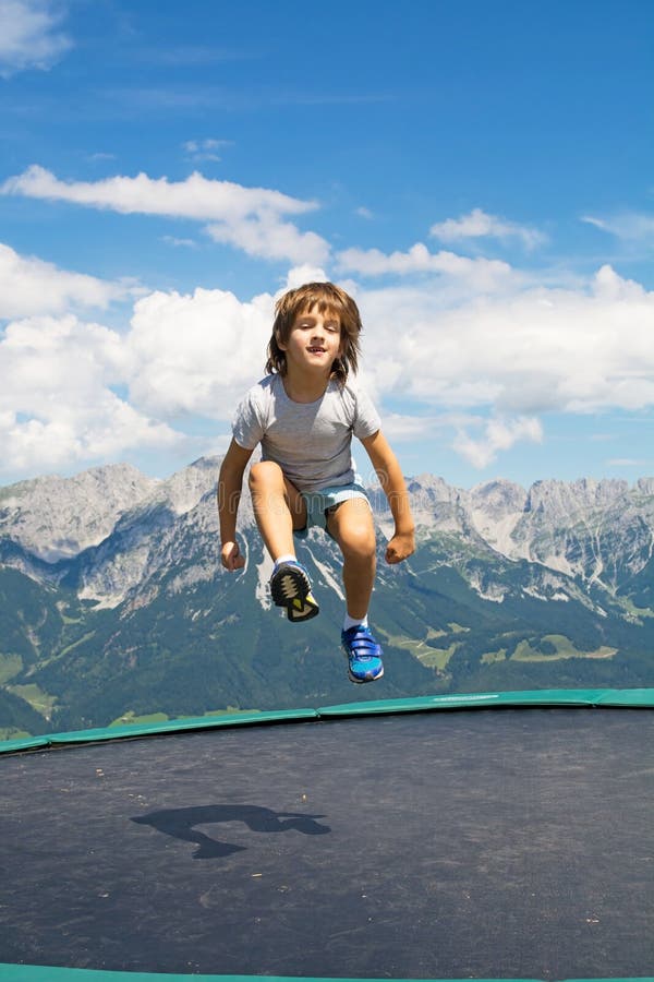 Happy child jumping stock photo. Image of play, trampolin - 43126704