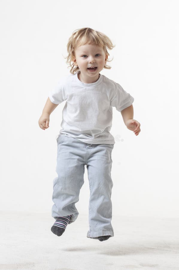 Happy Child Jumping on White Background Stock Photo - Image of people ...
