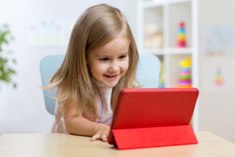 Happy Child Little Girl Using Tablet Computer Stock Photo - Image of ...