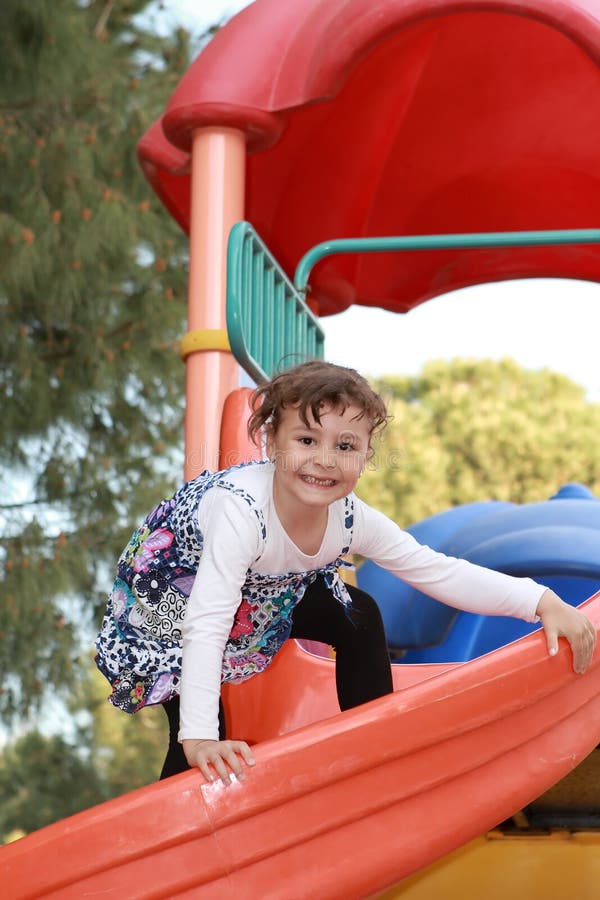 Happy Child in Park Playground Stock Image - Image of enjoying, happy ...