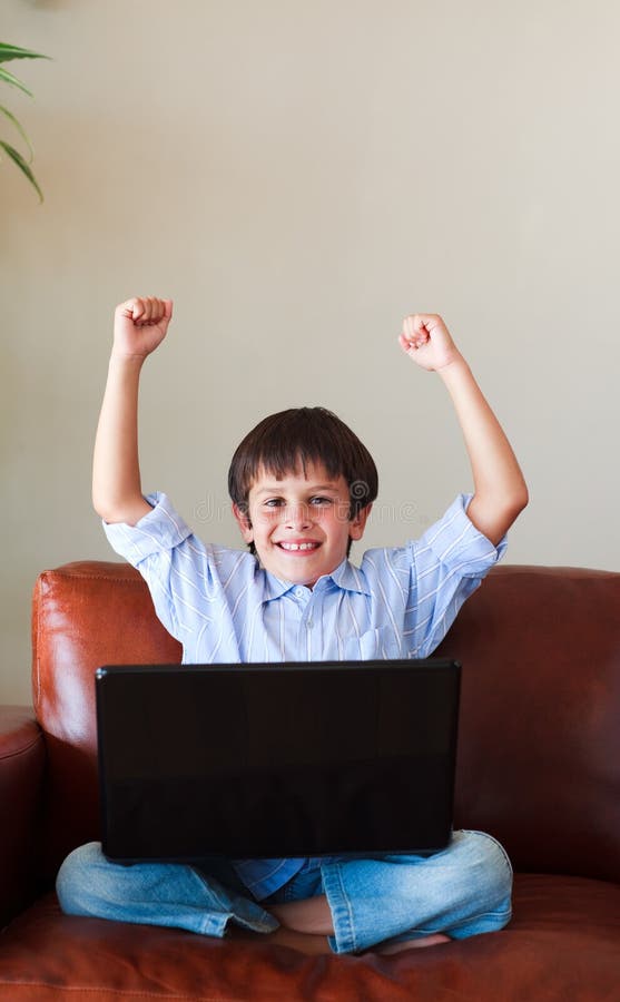 Happy Child Playing with His Laptop Stock Image - Image of music ...