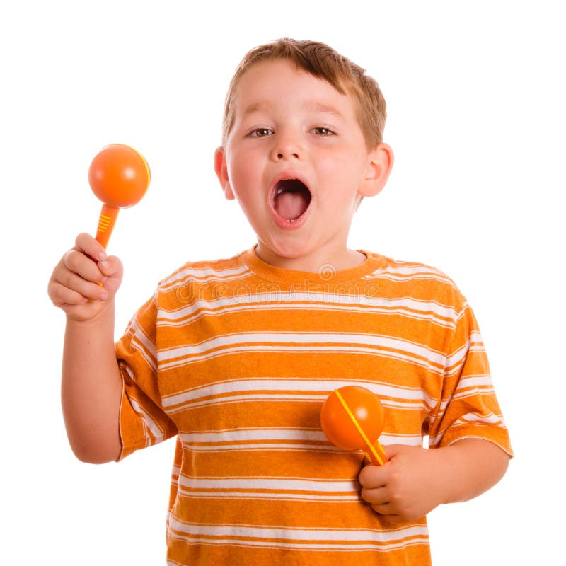 Happy Child Playing Maracas and Signing Stock Photo - Image of person ...