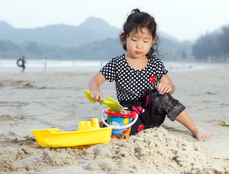 Happy Child Playing with Sand Stock Photo - Image of elementary, child ...