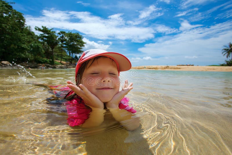 Happy child playing in sea stock image. Image of leisure - 50770829