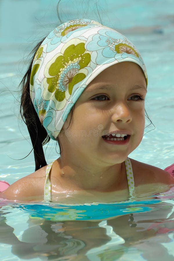 Happy child in pool stock image. Image of cute, face, color - 2904467
