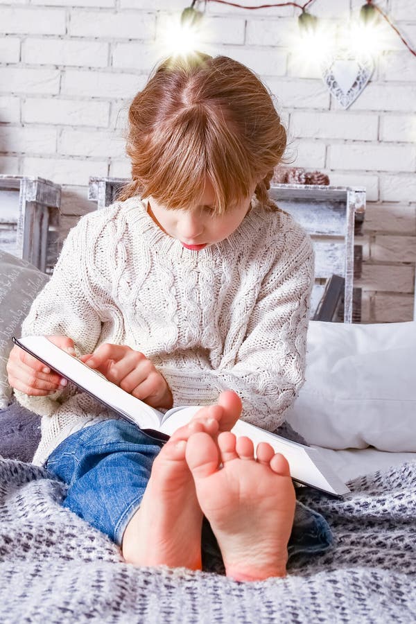 Happy Child Reading a Book at Christmas Stock Photo - Image of reading ...