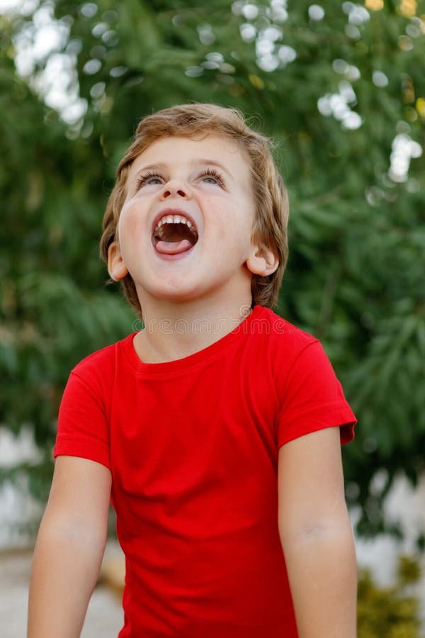 Happy Child with Red T-shirt in the Garden Stock Photo - Image of ...
