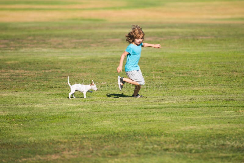 Happy Child Run with a Dog Outdoor. Stock Image - Image of childhood ...