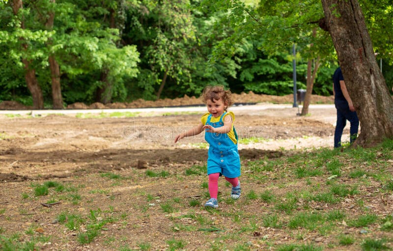 Happy Child Running in Nature Stock Image - Image of kids, green: 147917445