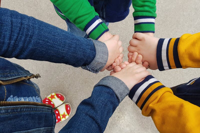 Happy Child Stacking Join Hand Together. Stock Image - Image of ...