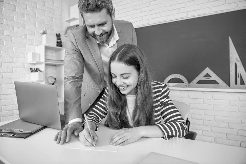 Happy Child with Tutor in Classroom Use Laptop Stock Image - Image of ...