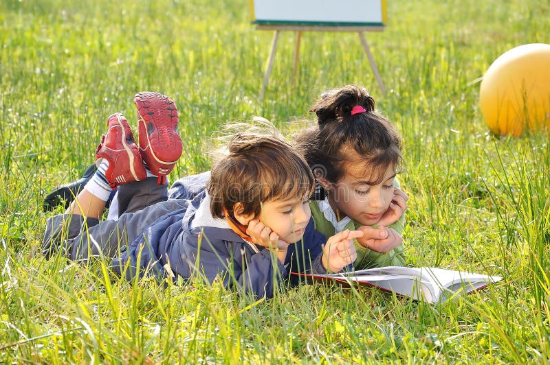Happy childhood stock image. Image of outdoors, attentive - 12478105