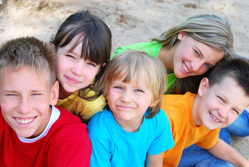 Diverse Group Og Children Laying Together on Grass. Stock Photo - Image ...