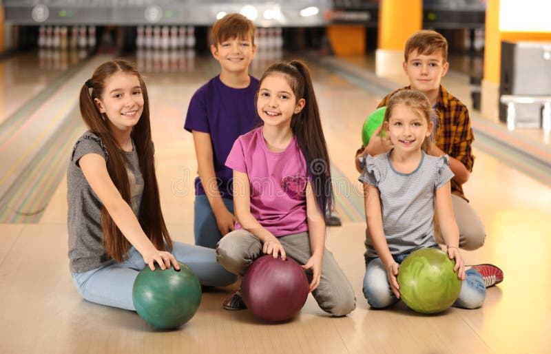 Happy Children with Balls in Bowling Stock Image - Image of indoors ...