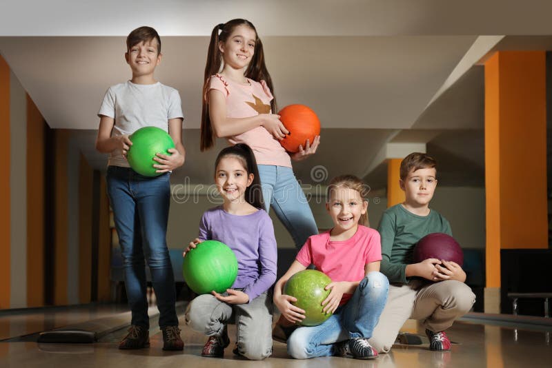 Happy Children with Balls in Bowling Stock Image - Image of lane, alley ...