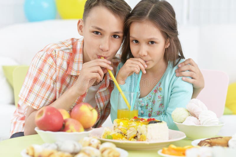 Happy children with cake stock image. Image of dessert - 74971765