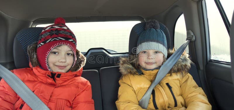 Happy Children in the Car in the Back Seat Winter Trip Stock Photo ...