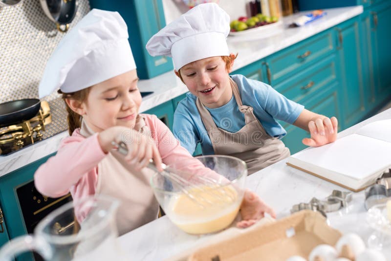 Happy Children in Chef Hats Making Dough Stock Image - Image of kitchen ...
