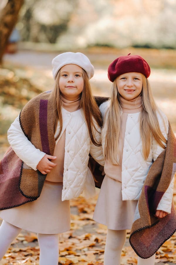 Happy Children Cuddling in a Beautiful Autumn Park Stock Image - Image ...