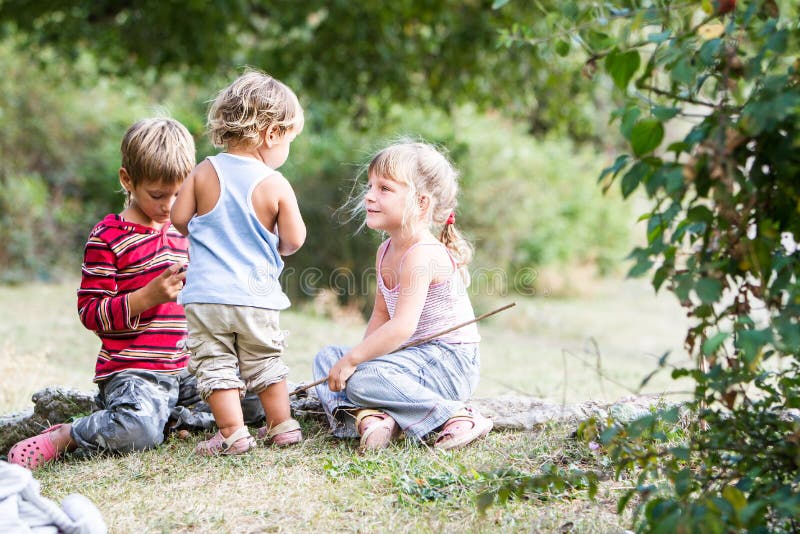 Happy Children Enjoying Their Time Outdoors Stock Photo - Image of ...