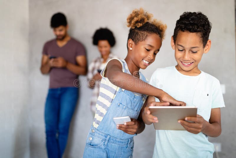 Happy Children Havig Fun and Using Technology Devices Stock Photo ...