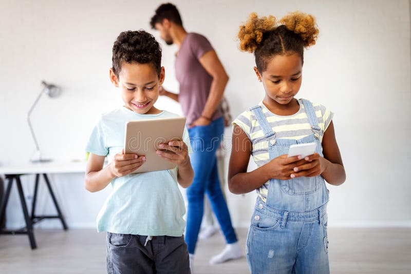 Happy Children Havig Fun and Using Technology Devices Stock Photo ...