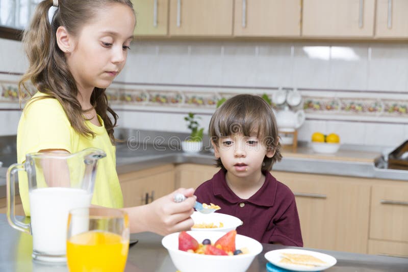 Happy Children Having Breakfast Stock Image - Image of happy, eating ...